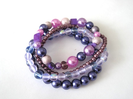 Sett med 4 armbånd - lilla - Epla