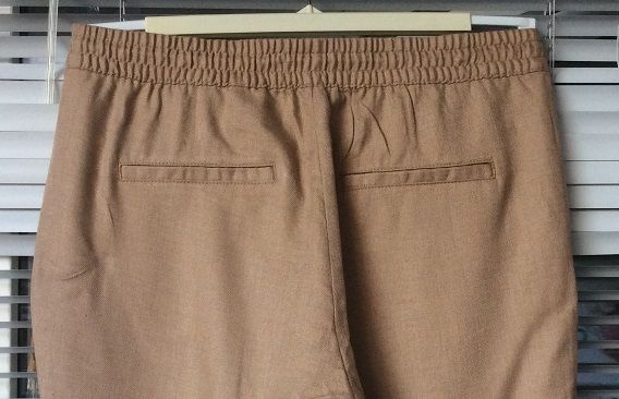 UBRUKT MØRK BEIGE BUKSE STR. 44 - Epla