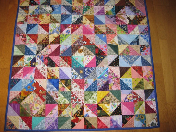 Vattert teppe i lappeteknikk - Epla