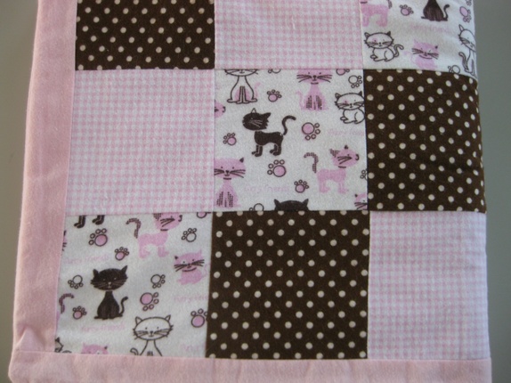 Vattert teppe i flanell,rosa og brunt - Epla