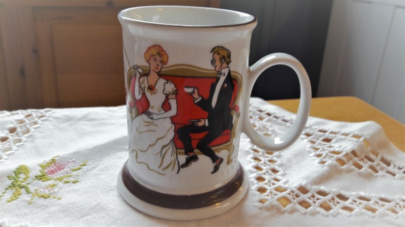 Kopp fra Porsgrund med reklamemotiv fra Freia - Epla