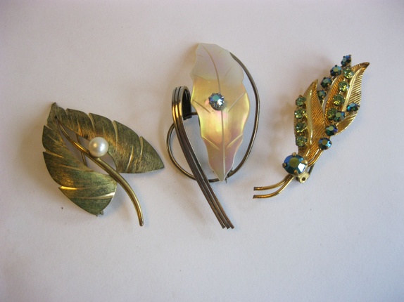 Tre gamle brosjer - Epla