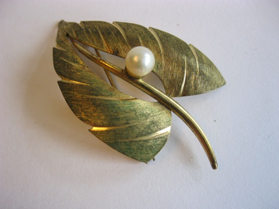 Tre gamle brosjer - Epla