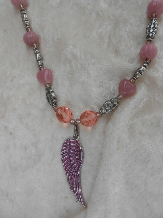 DEN ROSA FJÆR smykke - Epla