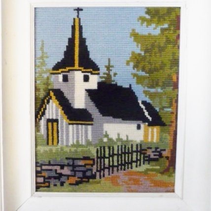 Brodert bilde av en kirke. - Epla