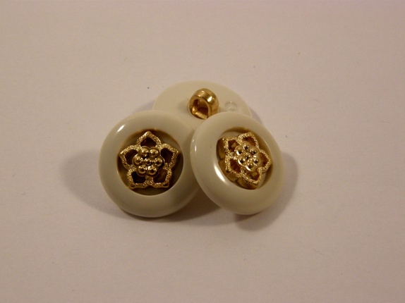 Hvite knapper med gullblomster - Epla