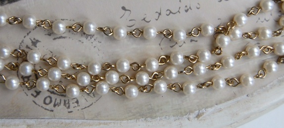 Langt perlekjede. - Epla