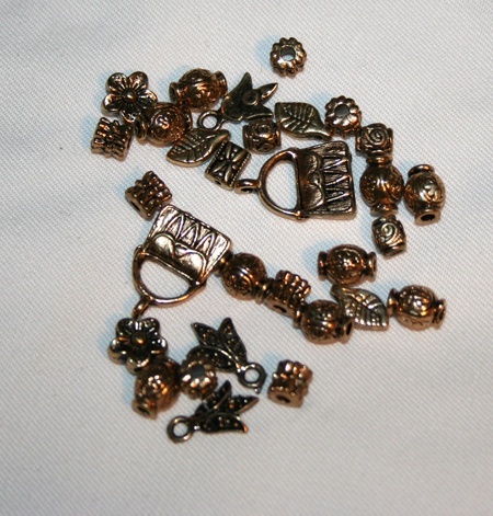 Skrin med smykkedeler - Epla