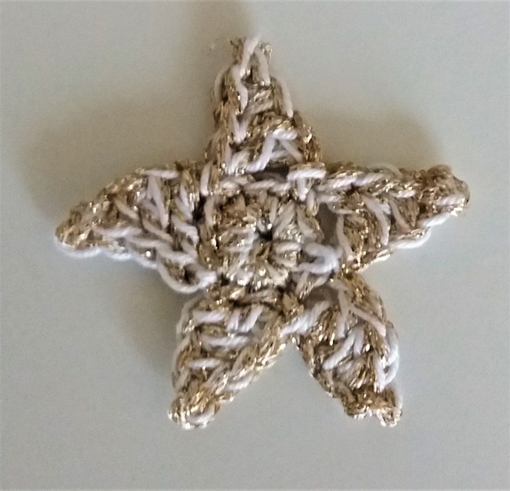 1 Sett m/6 hekla stjerner i gull og hvitt. - Epla