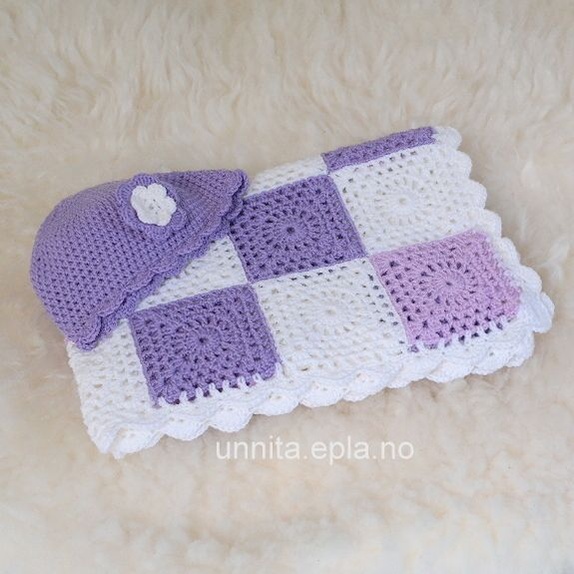 Nydelig babyteppe med babylue - Epla