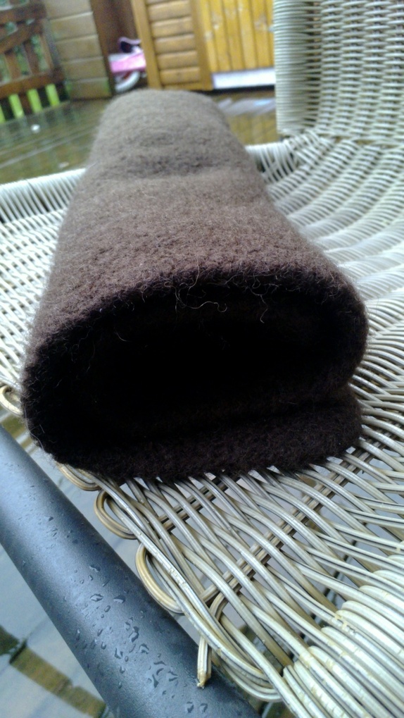 Sjokoladebrunt tovet sitteunderlag. - Epla