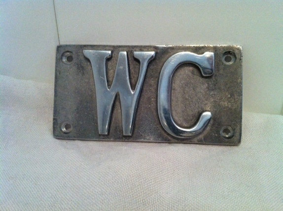 Metallskilt med "WC" - Epla